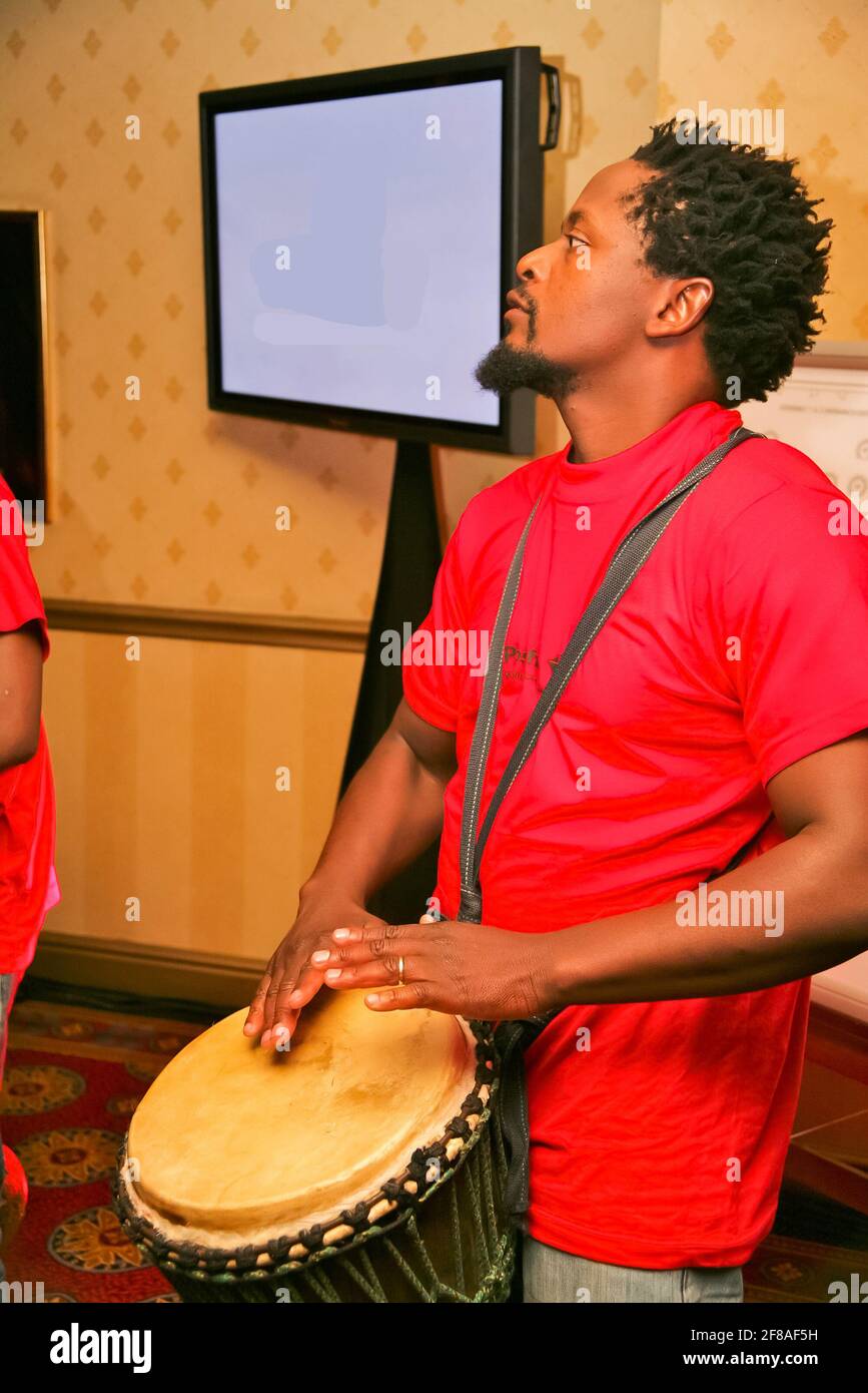 Zulu man playing drum hi-res stock photography and images - Alamy
