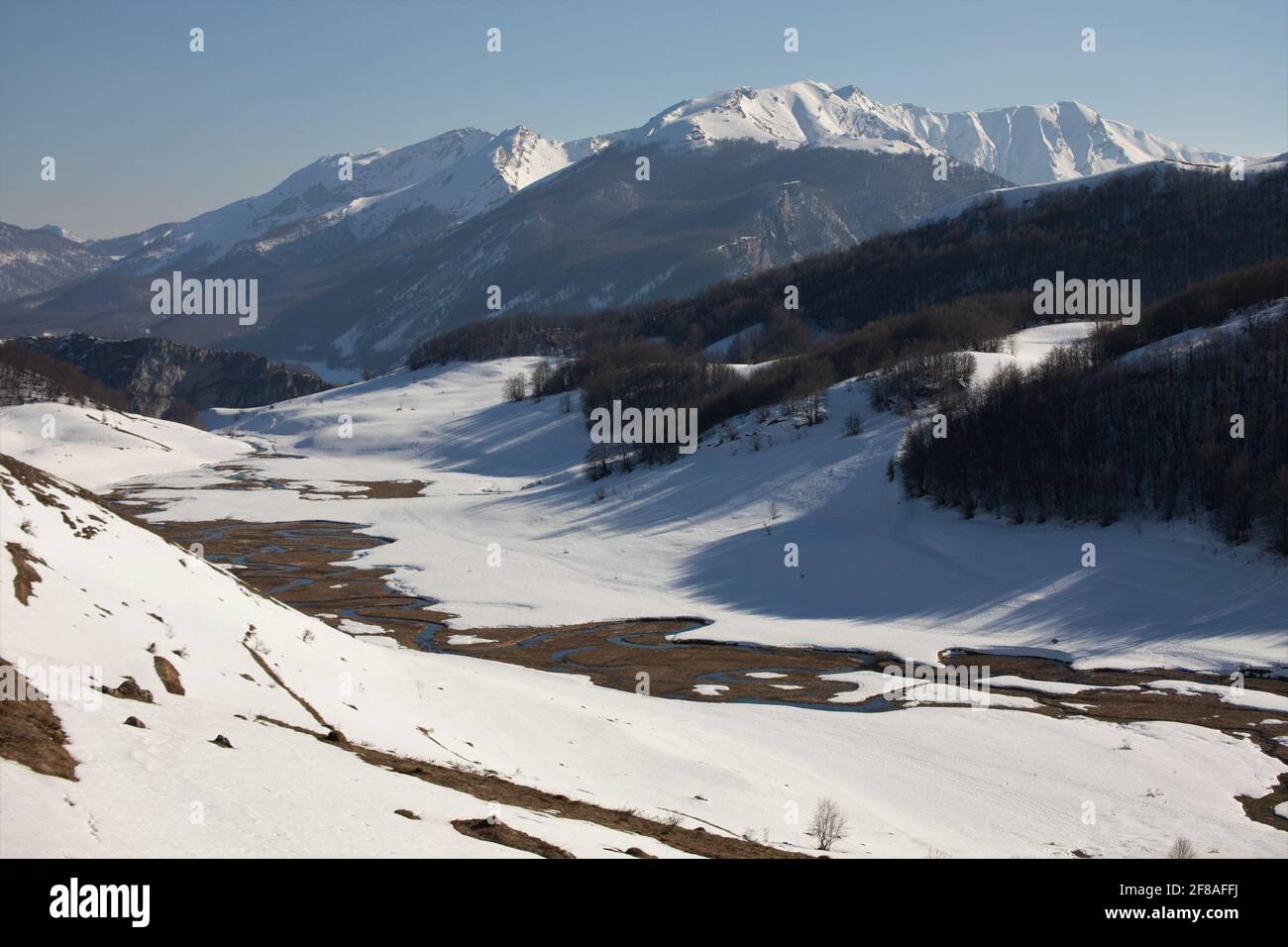 Beautiful landscape of a snowy mountain summit in daylight Stock Photo ...