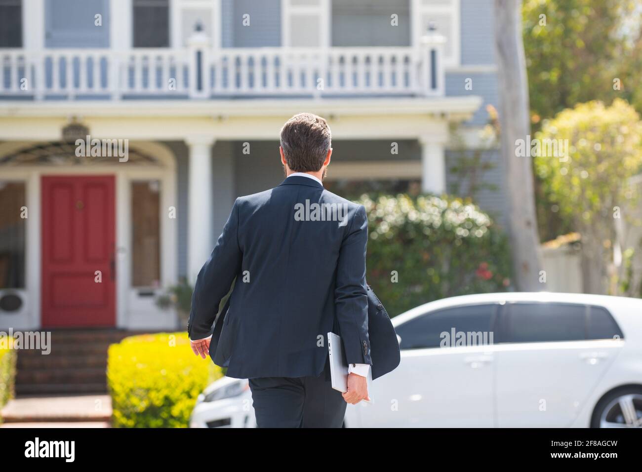 Back view going handsome man hi-res stock photography and images - Alamy