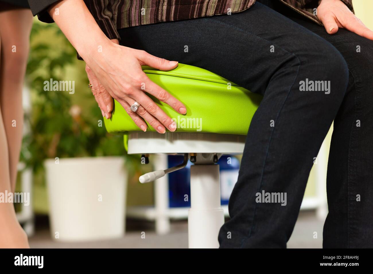 Person adjusting two modern office hi-res stock photography and images ...