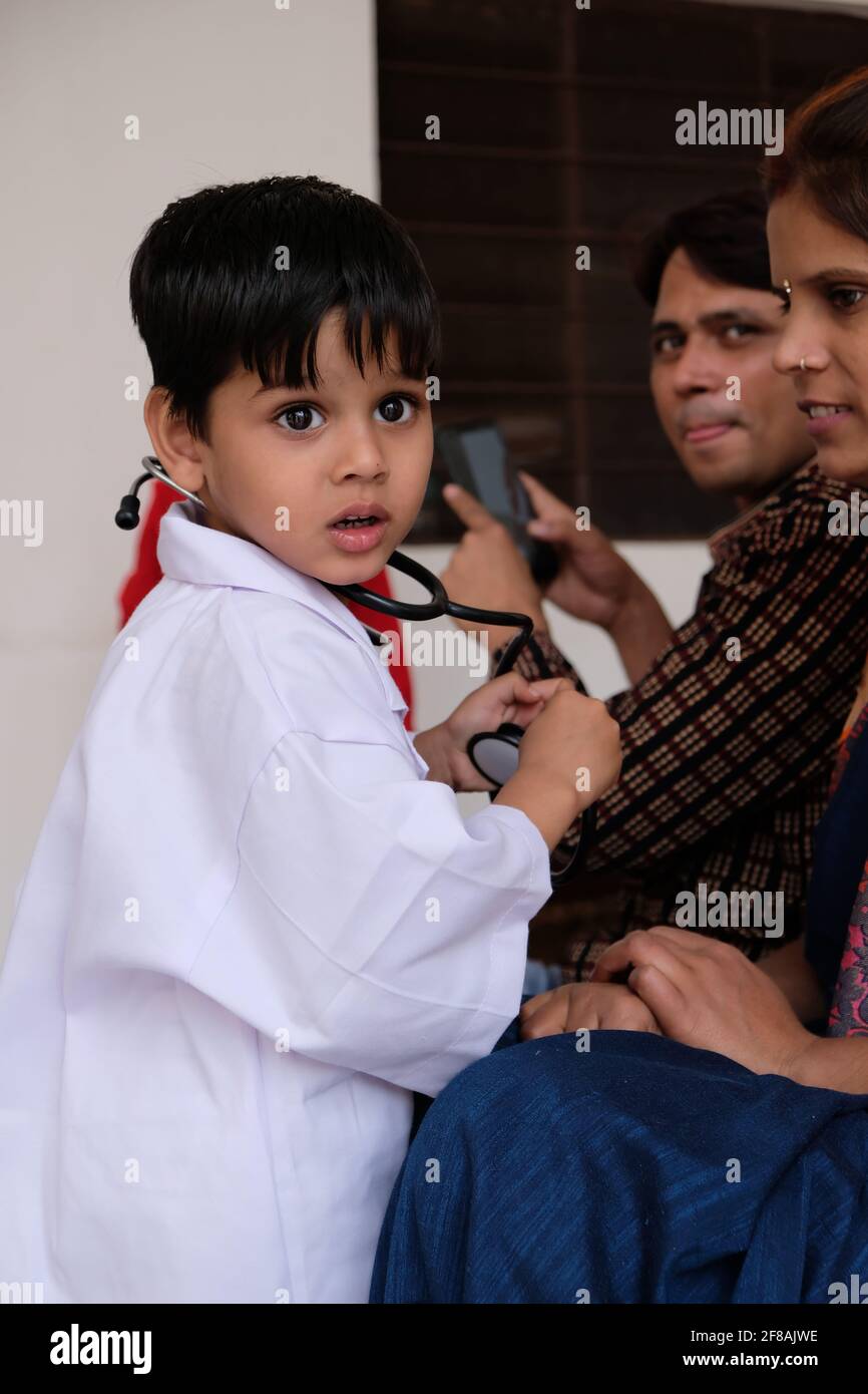 Father son playing doctor hi-res stock photography and images - Alamy