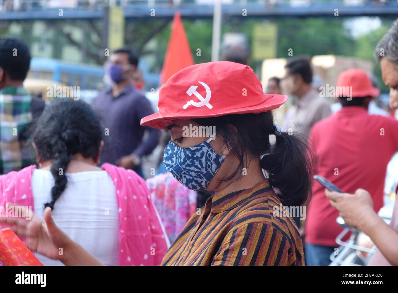 KOLKATA, INDIA - Sep 07, 2015: A woman with red cap of Communist party ...