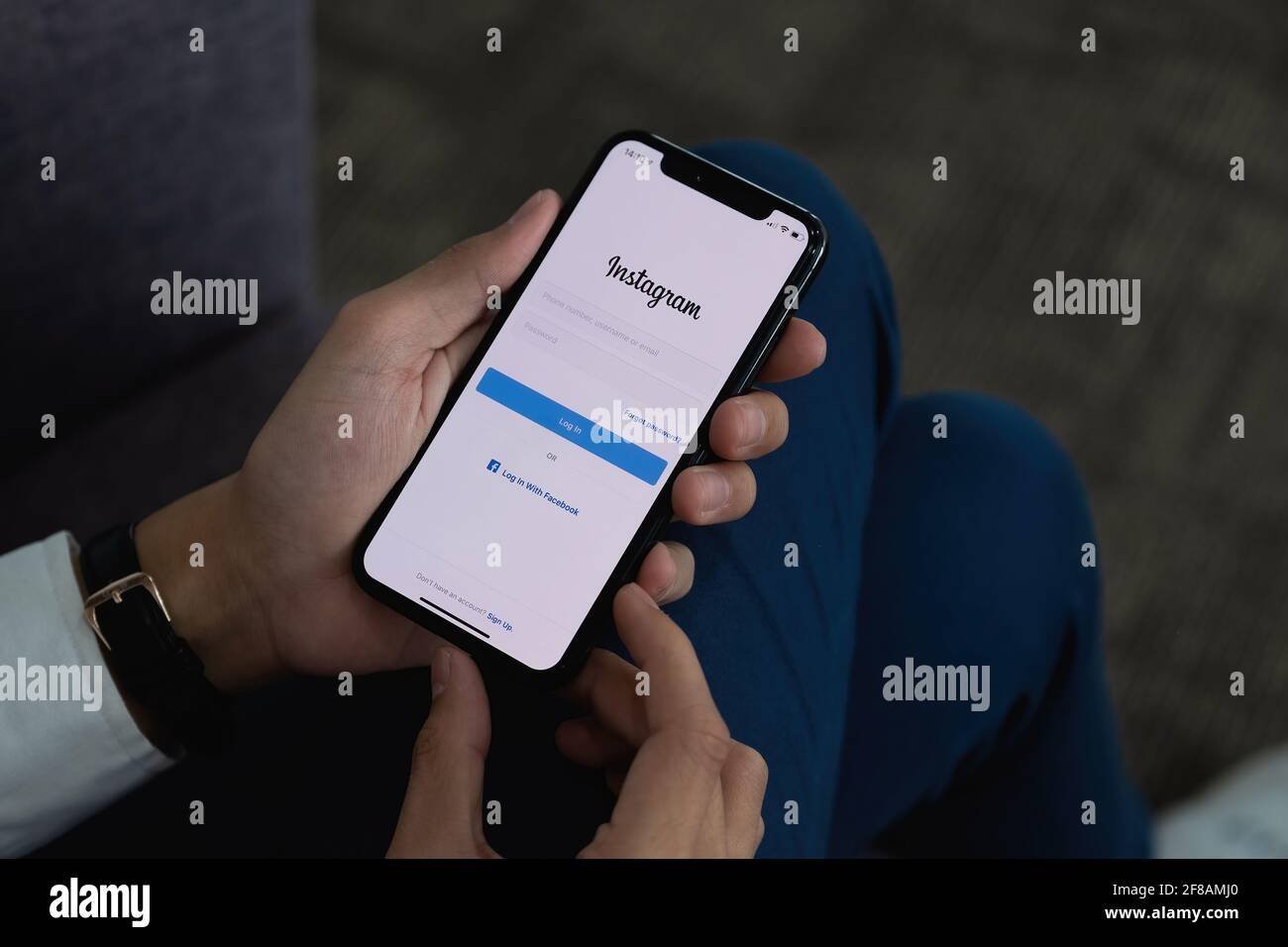 Instagram logo hand screen hi-res stock photography and images - Alamy