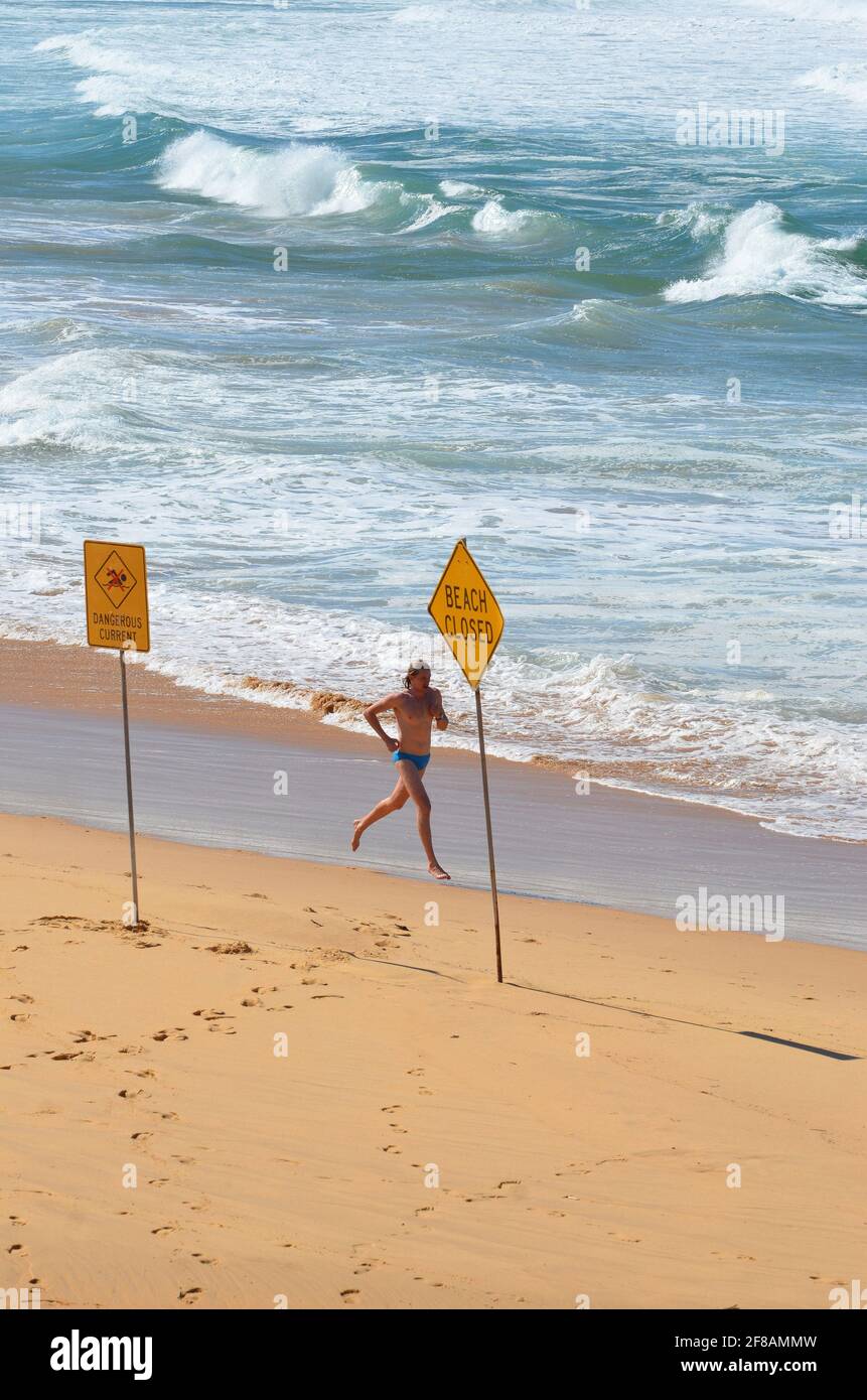 Runner on the beach Stock Photo - Alamy
