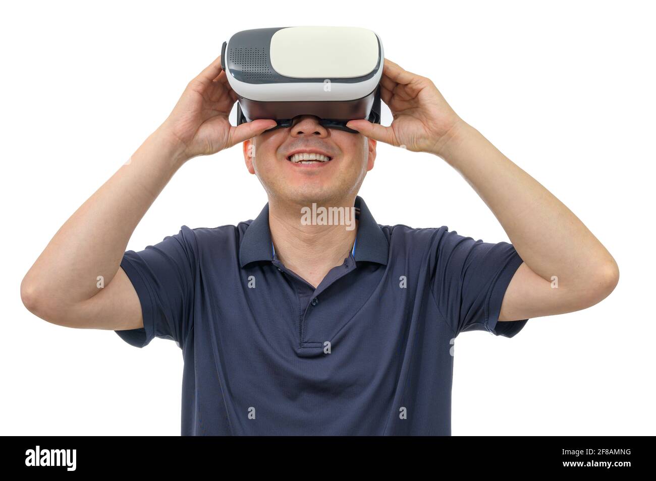Man wearing virtual reality goggles. Studio shot, white background ...