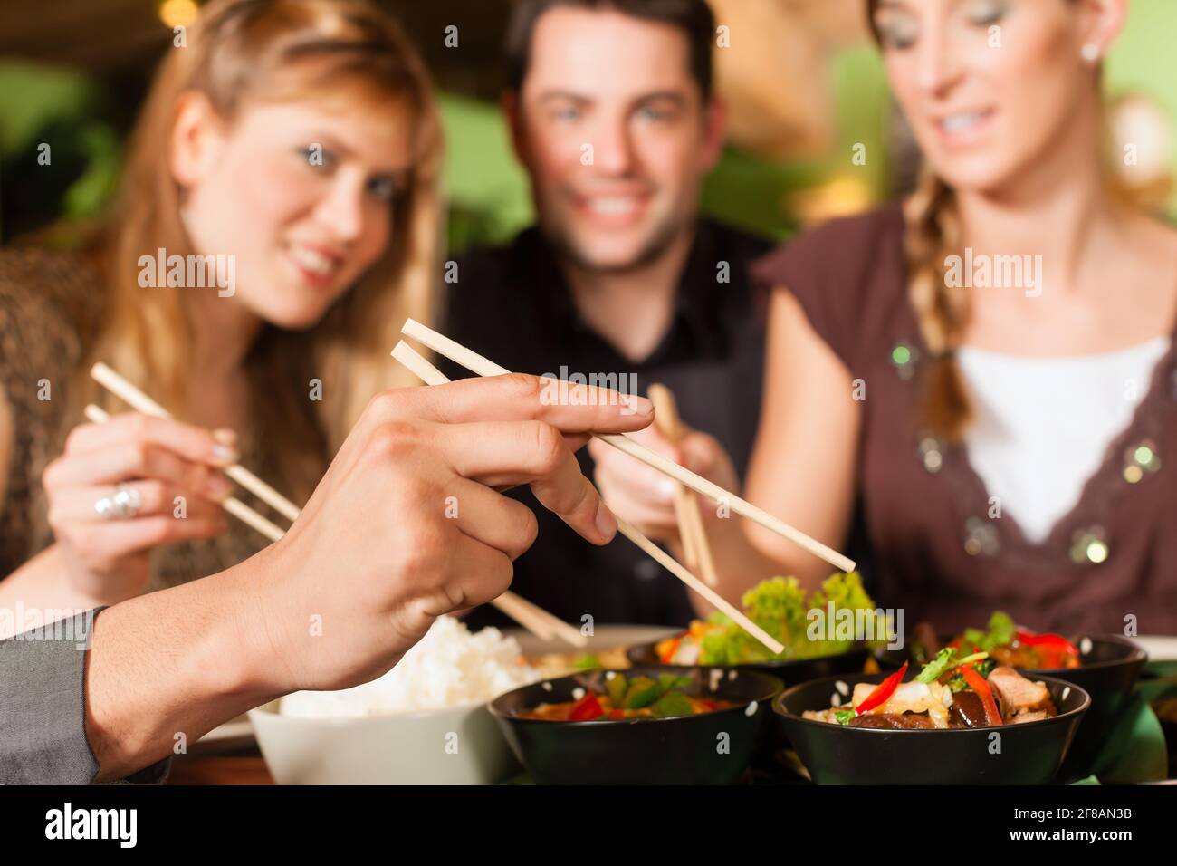 Man eating bowl rice chopsticks hi-res stock photography and images - Alamy