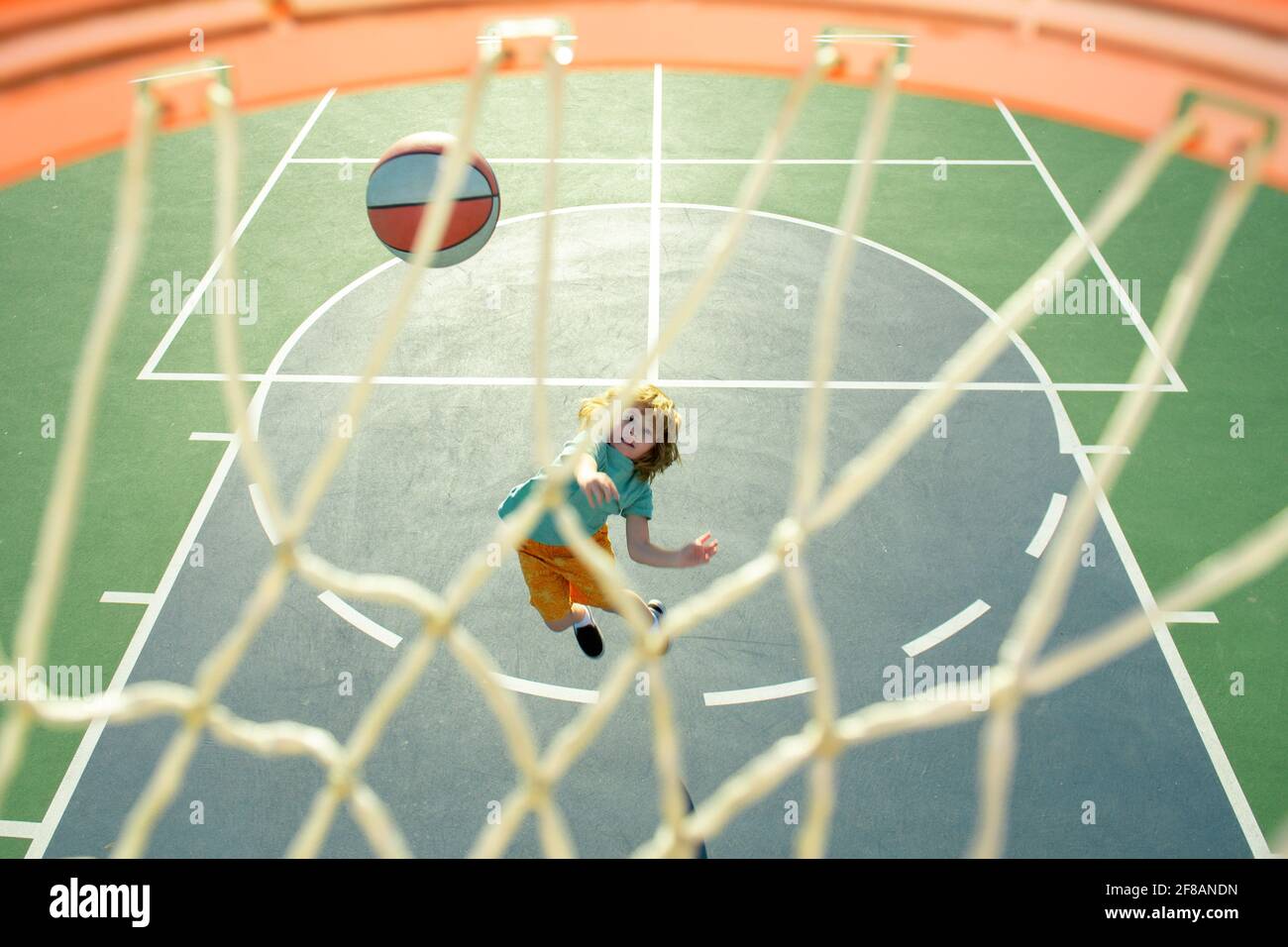 Kids Playing Basketball Outside High Resolution Stock Photography and ...