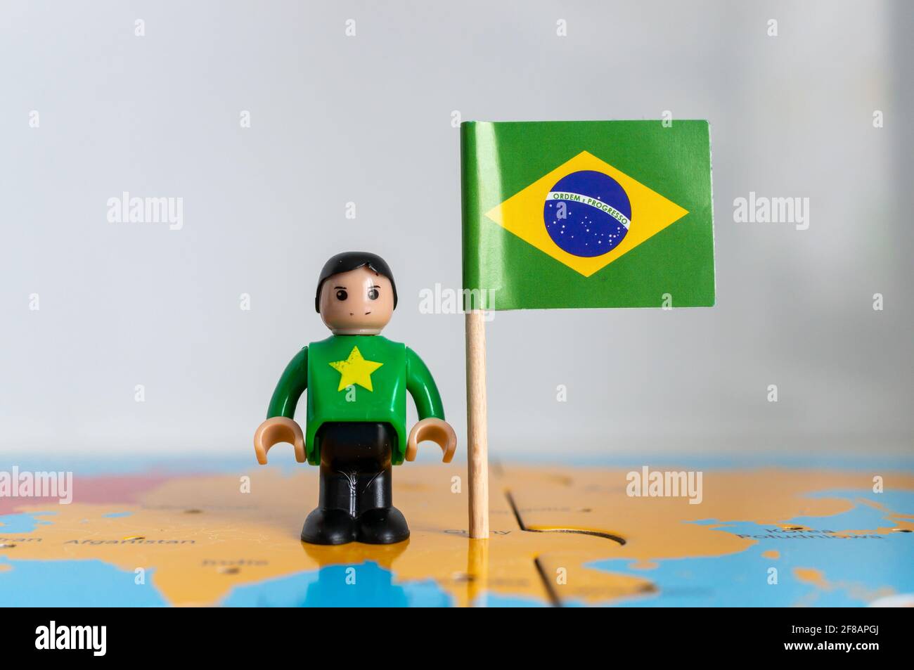 POZNAN, POLAND - Apr 06, 2021: Playtive toy figurine standing next to a ...