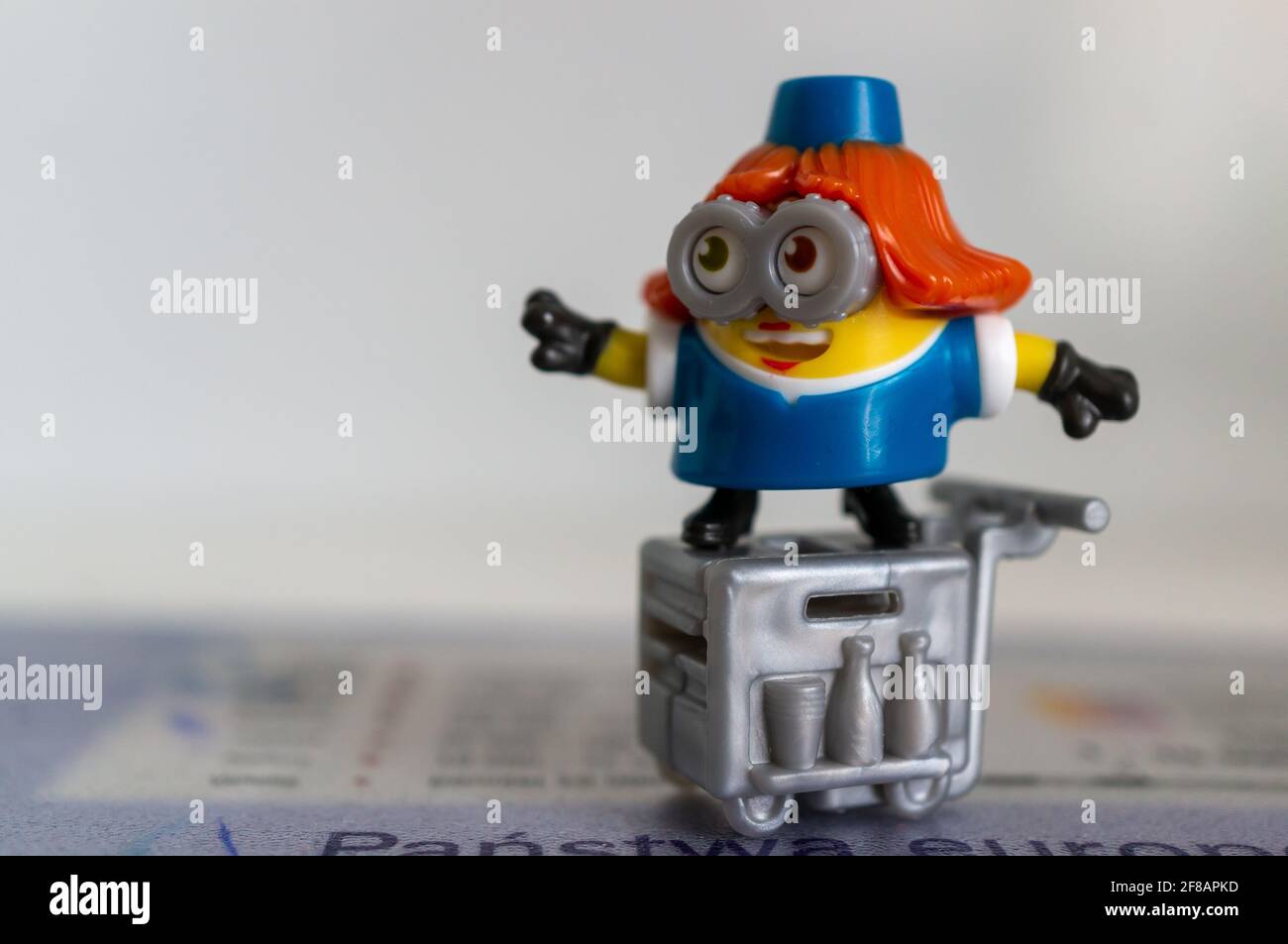 POZNAN, POLAND - Apr 06, 2021: Plastic toy Minion figurine standing on ...