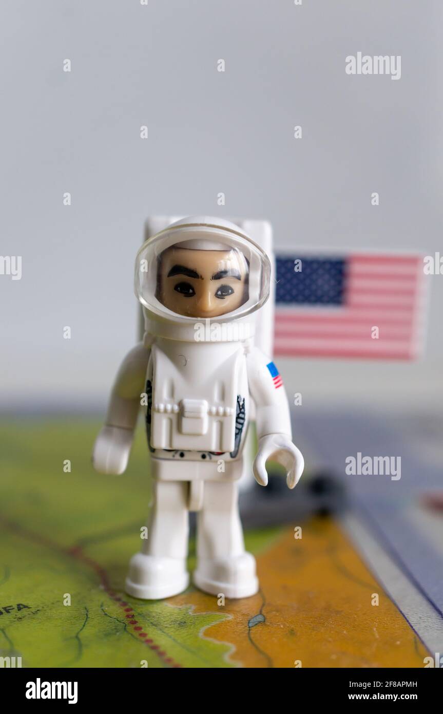 POZNAN, POLAND - Apr 06, 2021: Cobi toy figurine astronaut next to a ...