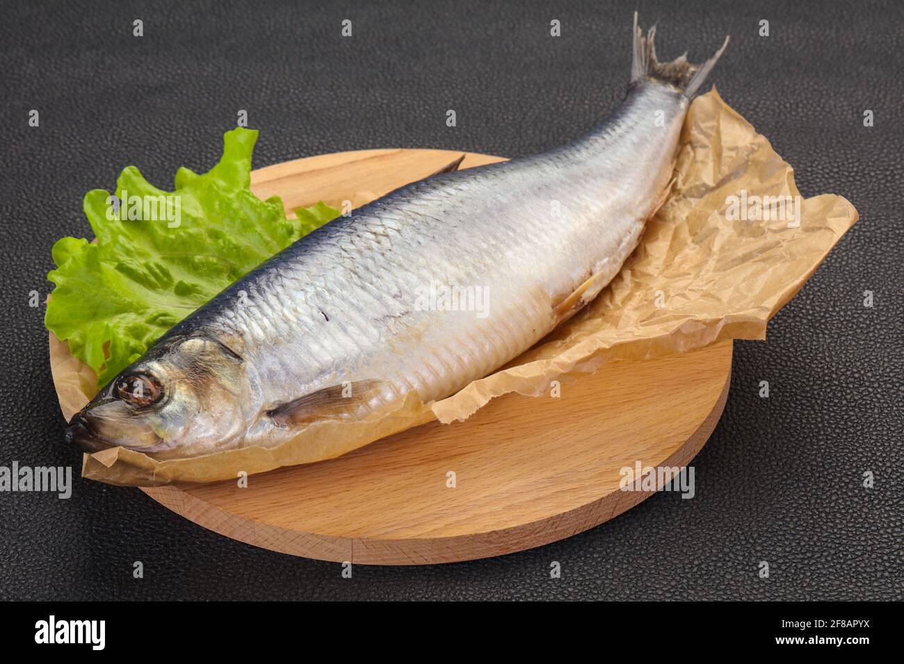 Salted herring fish ready for eat Stock Photo - Alamy
