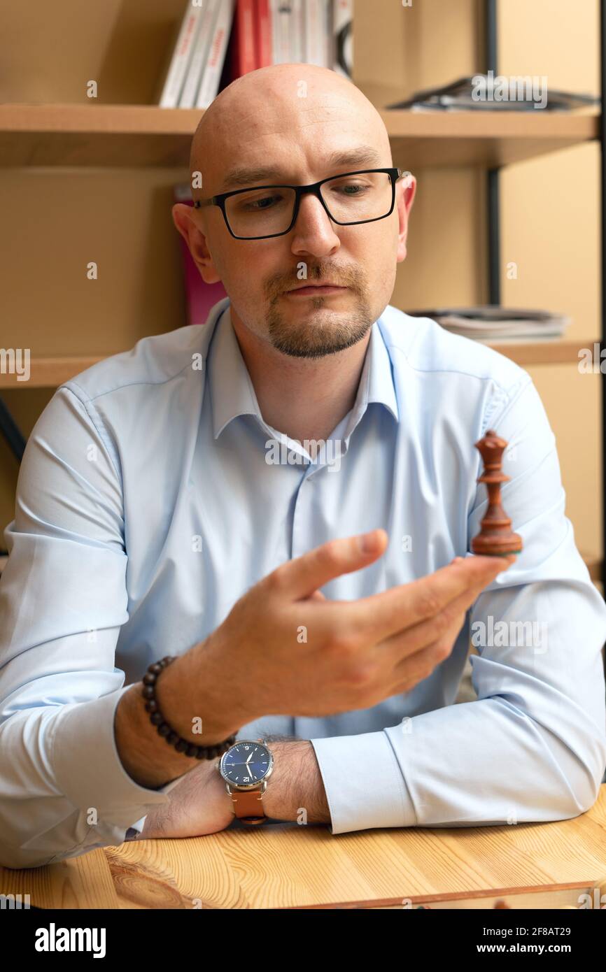 Bald sitting figure hi-res stock photography and images - Alamy