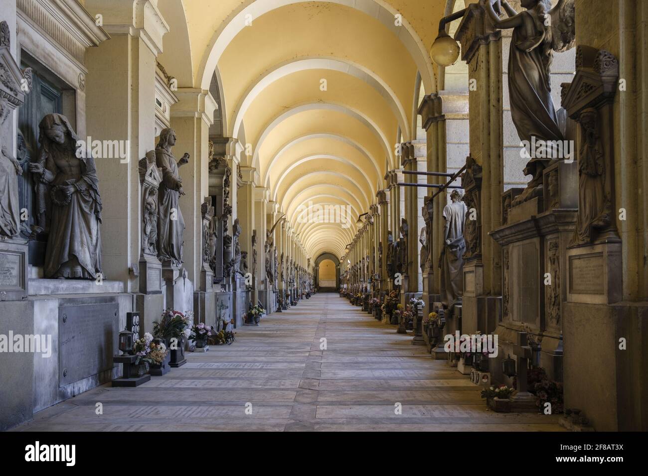 Beautiful shot of an arched interior with statues in an old fortress ...
