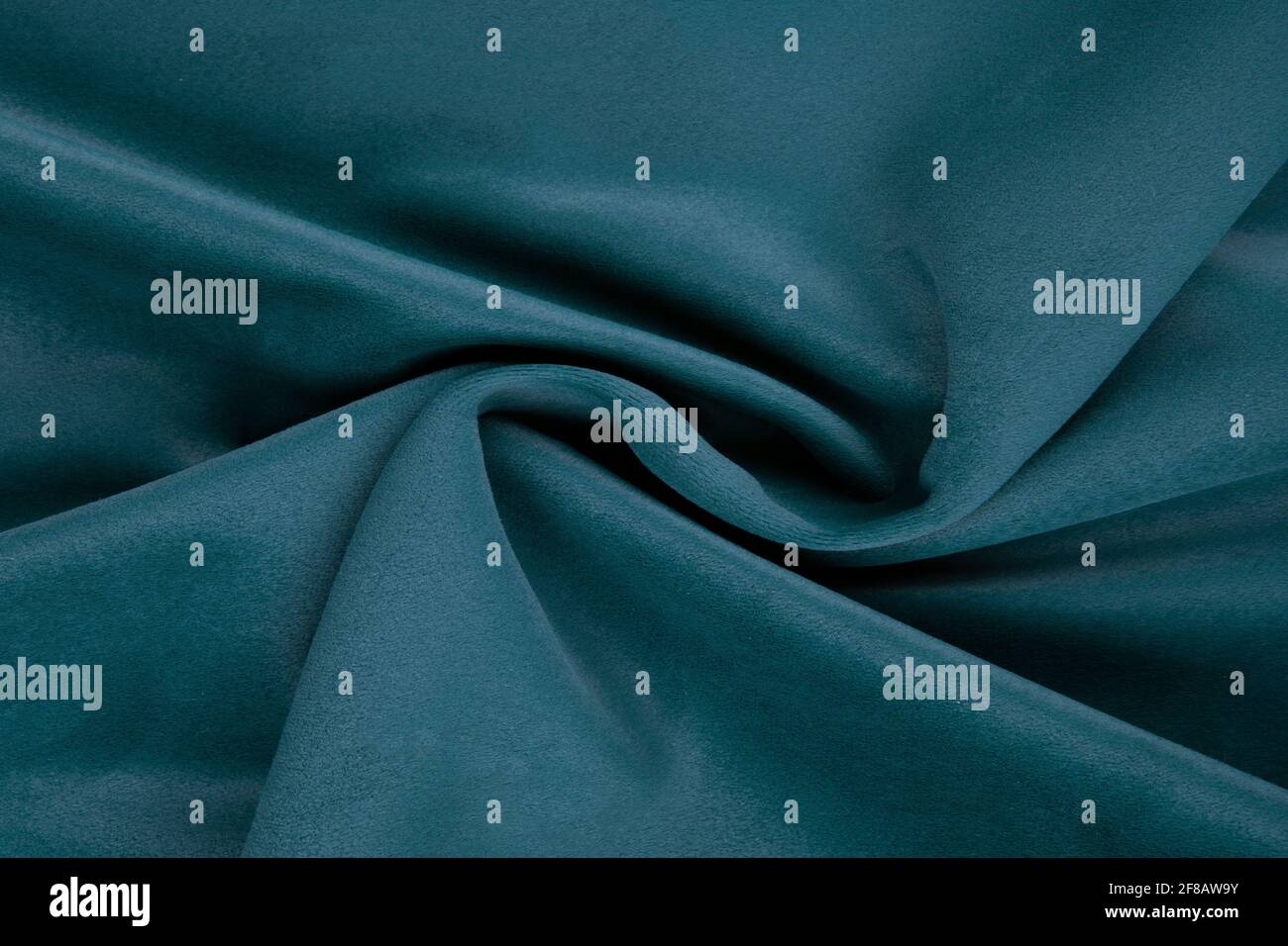 Turquoise fabric texture - top view and close-up of a piece of crushed ...