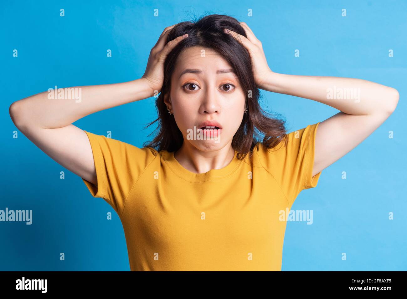 The beautiful Asian woman is in shock Stock Photo - Alamy