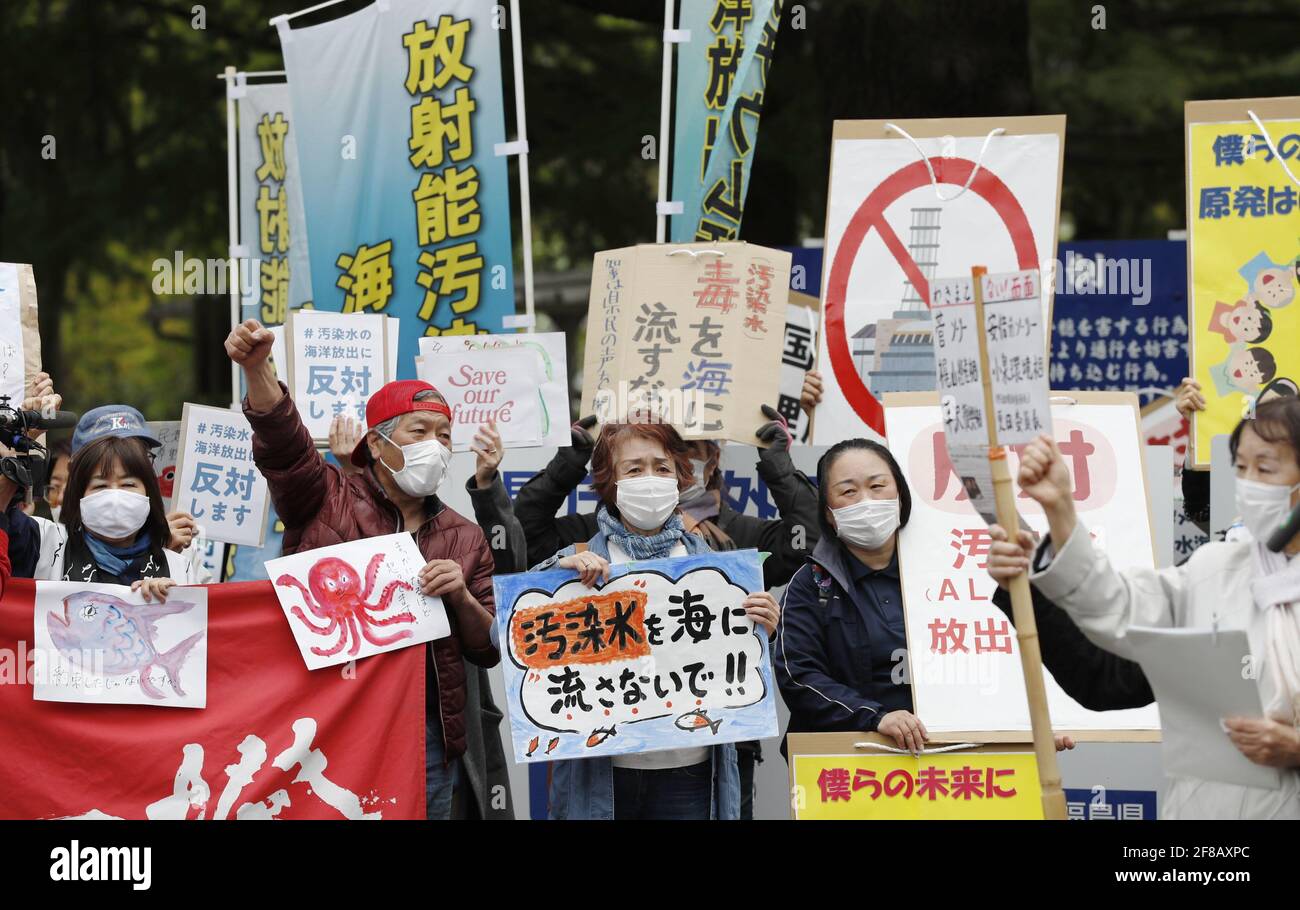 Fukushima, Japan. April 13 2021: People stage a protest rally in front ...
