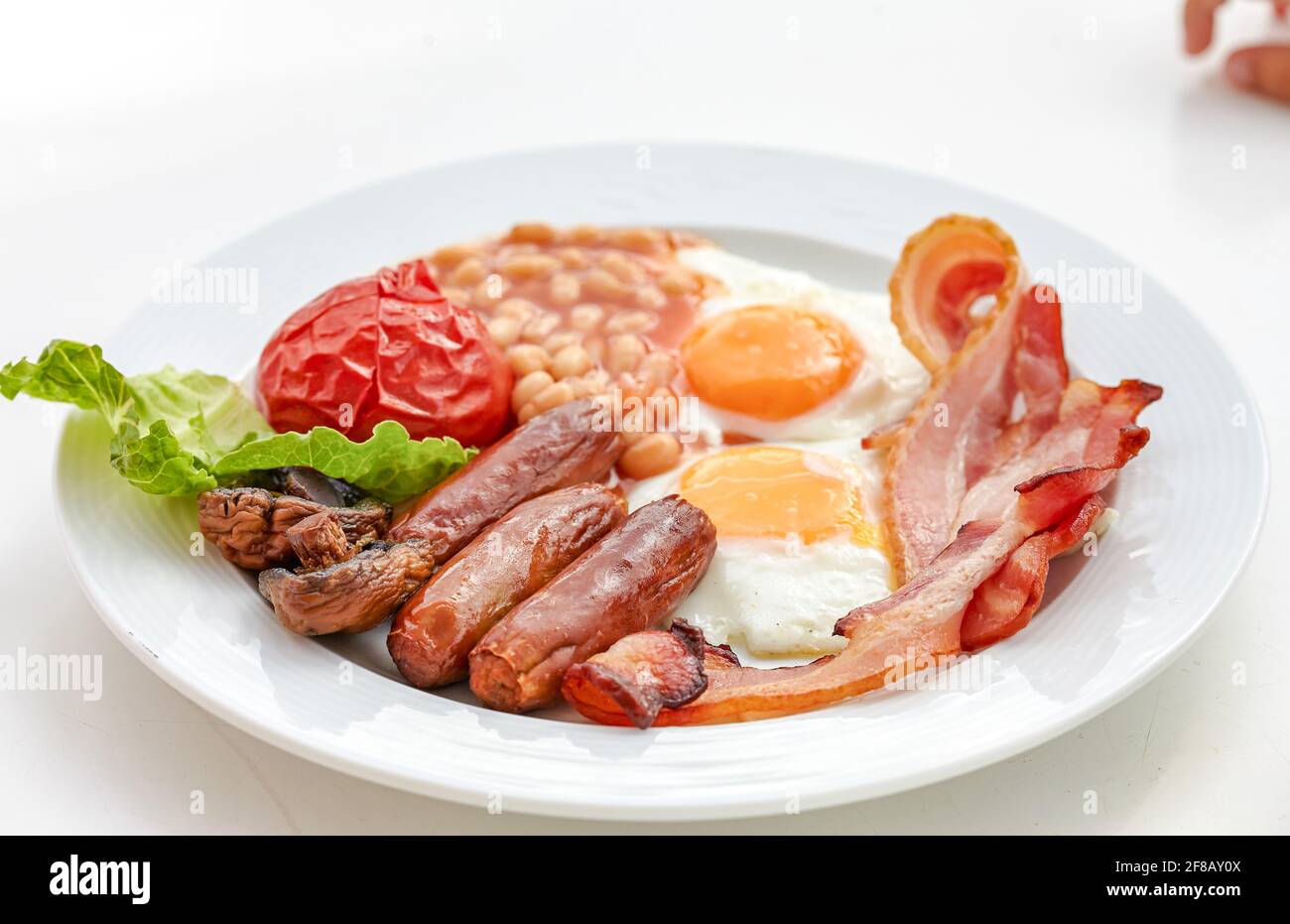 Outdoor natural sunlight of a traditional English breakfast with sunny ...