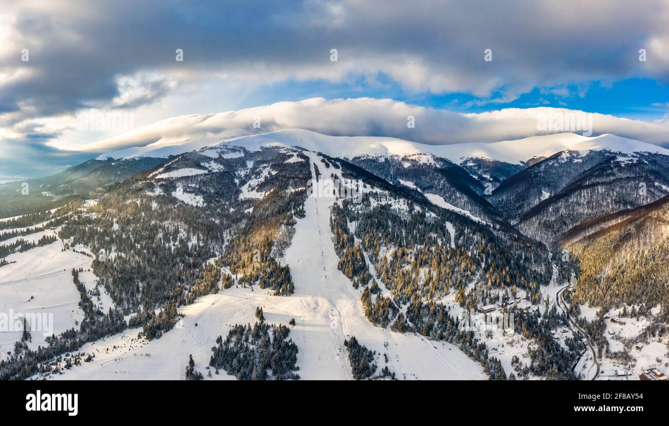Magical winter panorama of beautiful snowy slopes Stock Photo - Alamy