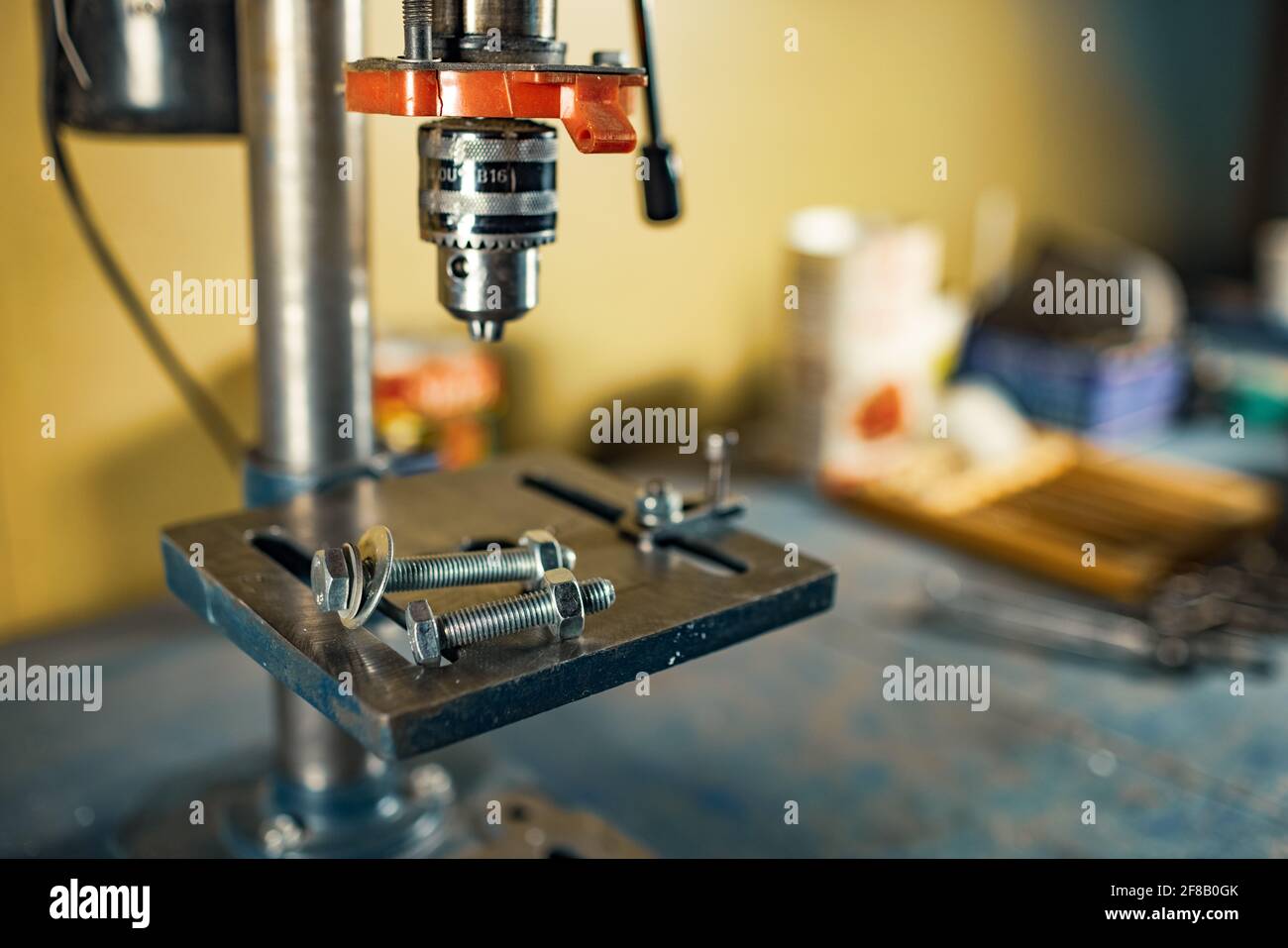 Drilling machine at the workplace in workshop Stock Photo - Alamy