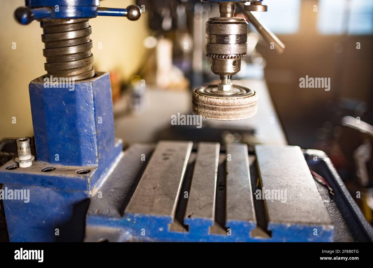 Drilling machine at the workplace in workshop Stock Photo - Alamy