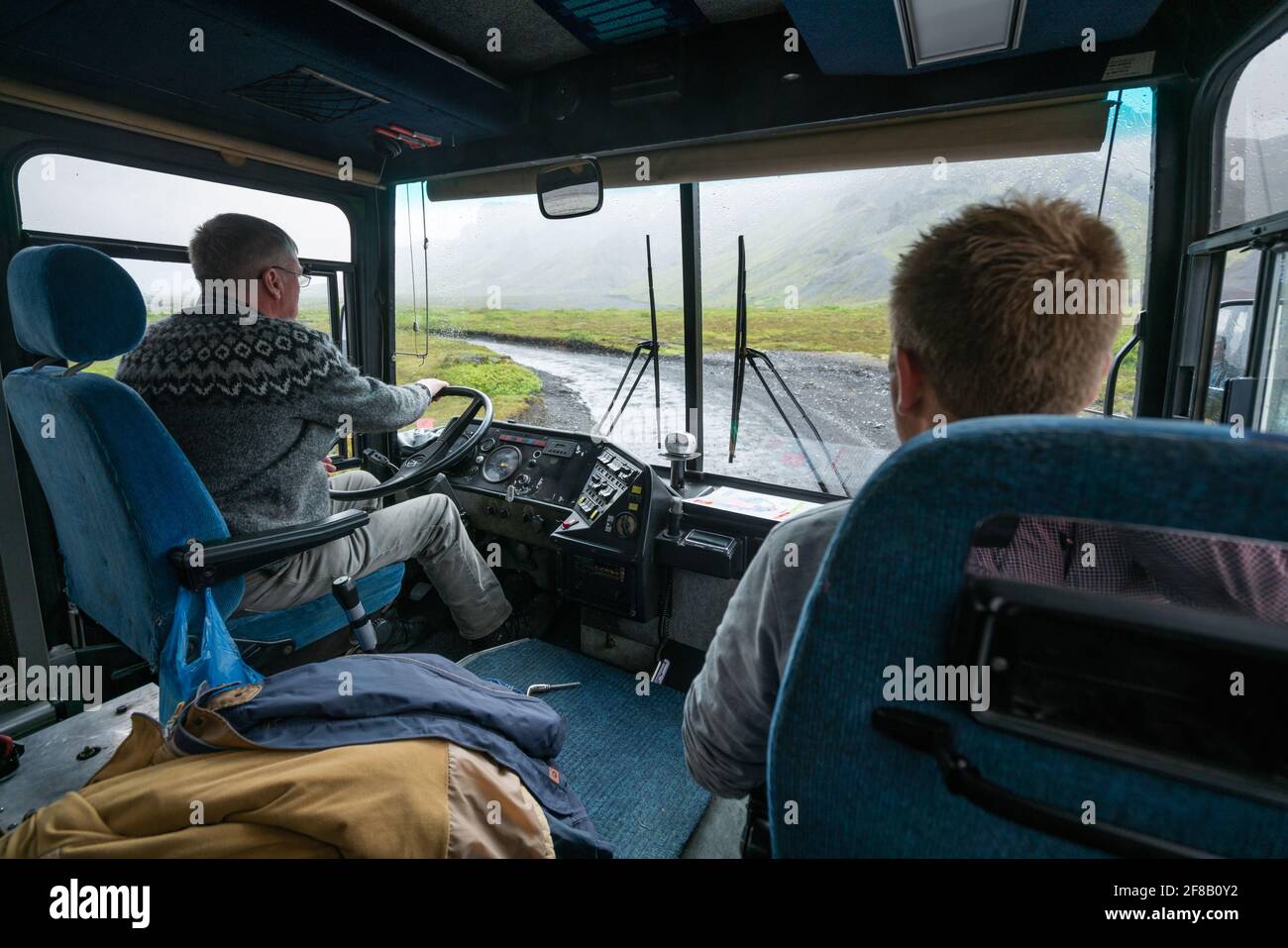 Thorsmork,Iceland-06.05.2019: Driver of an off-road bus pays close ...