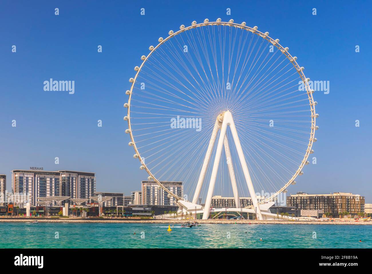 Dubai, UAE - March 04, 2021: Ferris wheel on Dubai Marina beach Stock ...