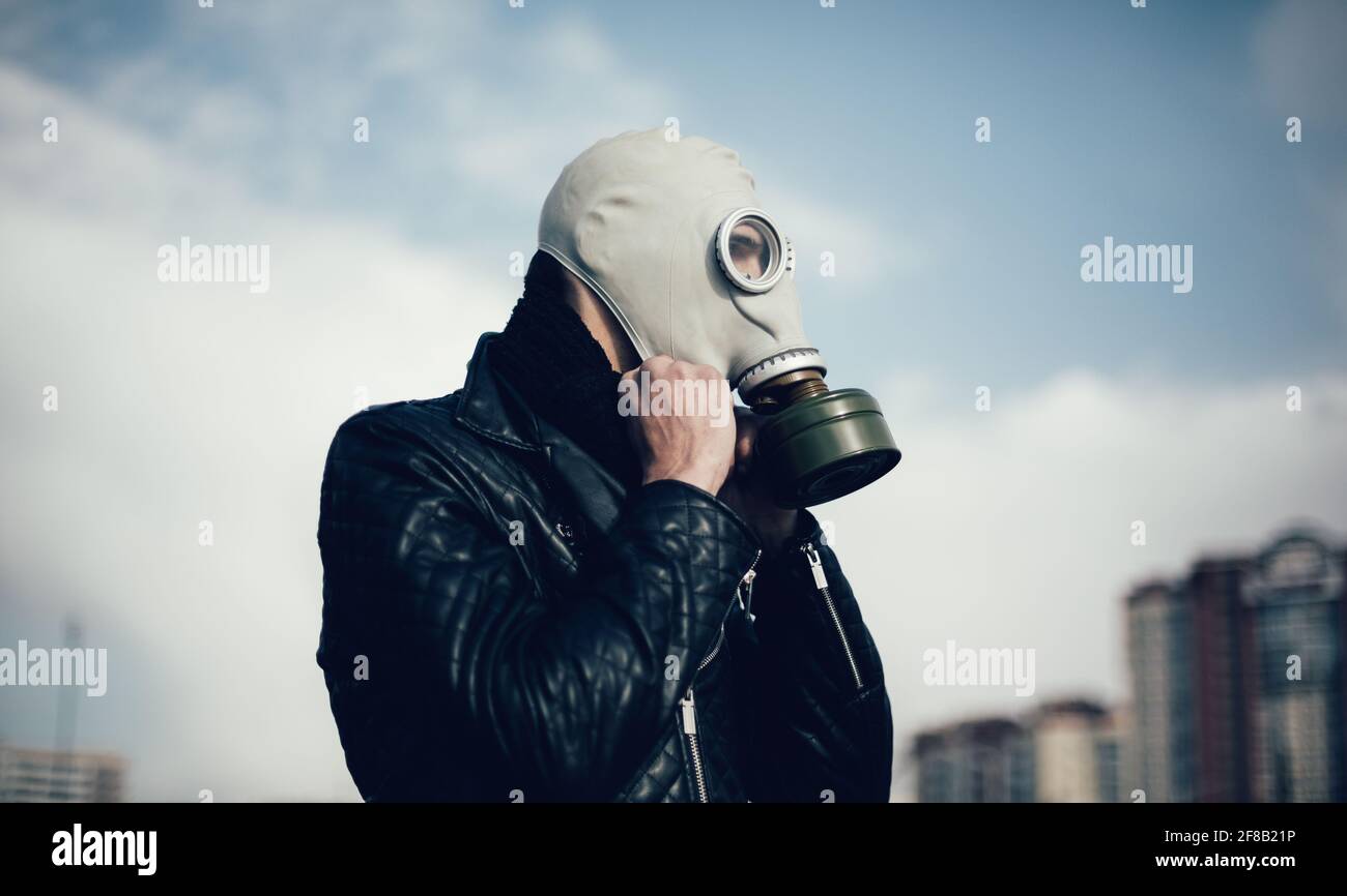 close up. casual guy in a gas mask Stock Photo - Alamy