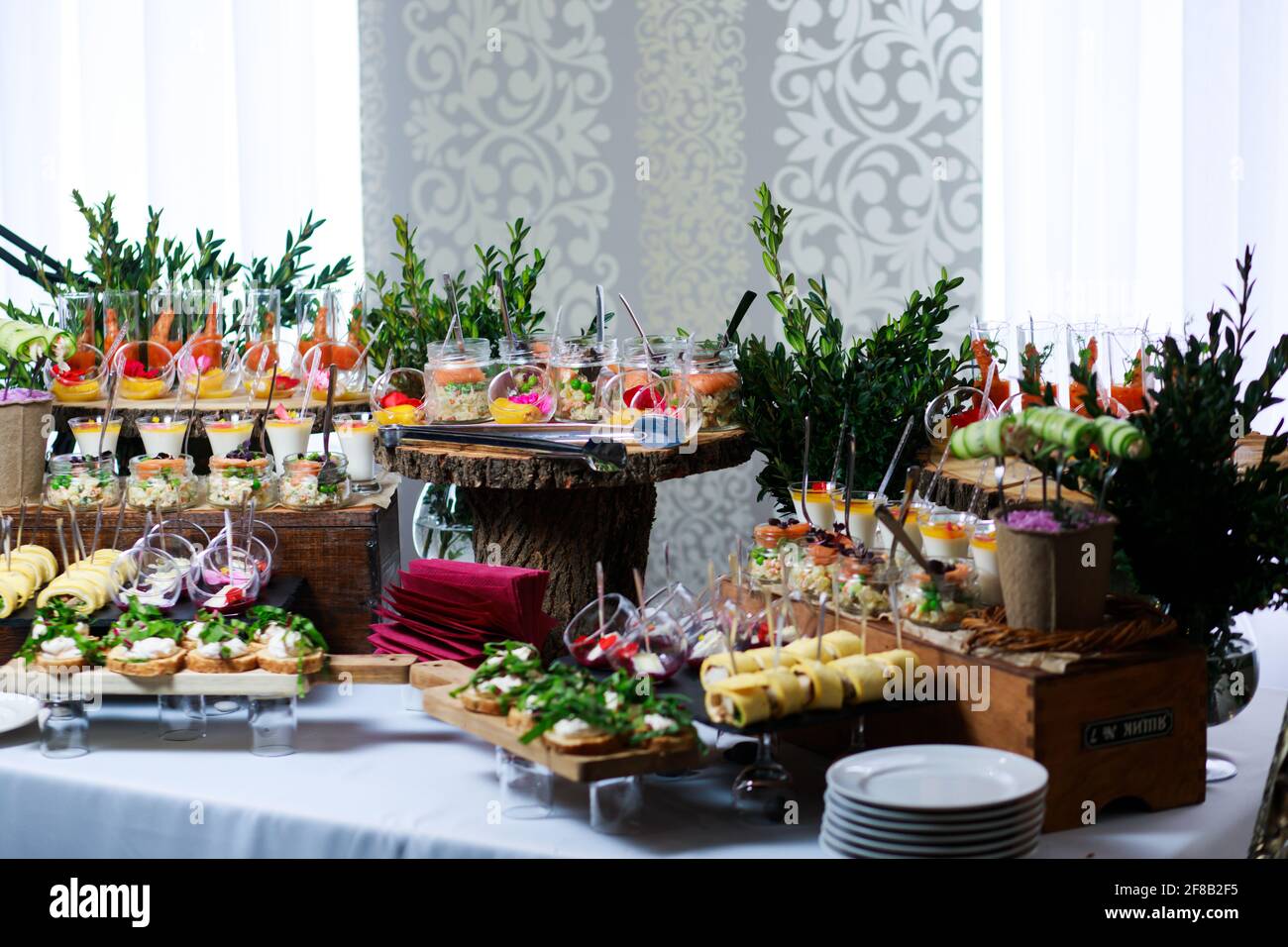 Catering service. Snacks for guests on the table Stock Photo - Alamy