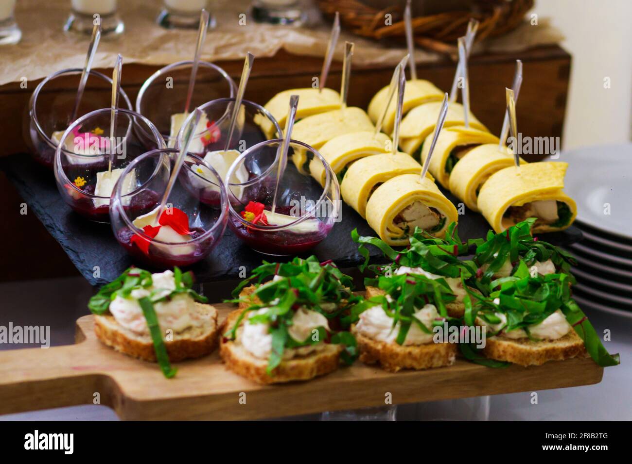 Catering service. Snacks for guests on the table Stock Photo - Alamy