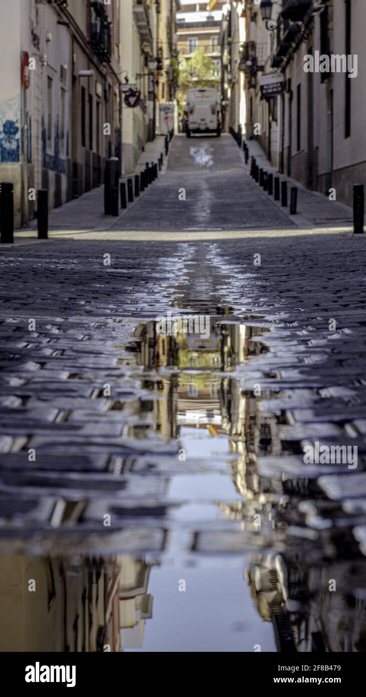 Reflection on puddle in walkway hi-res stock photography and images - Alamy