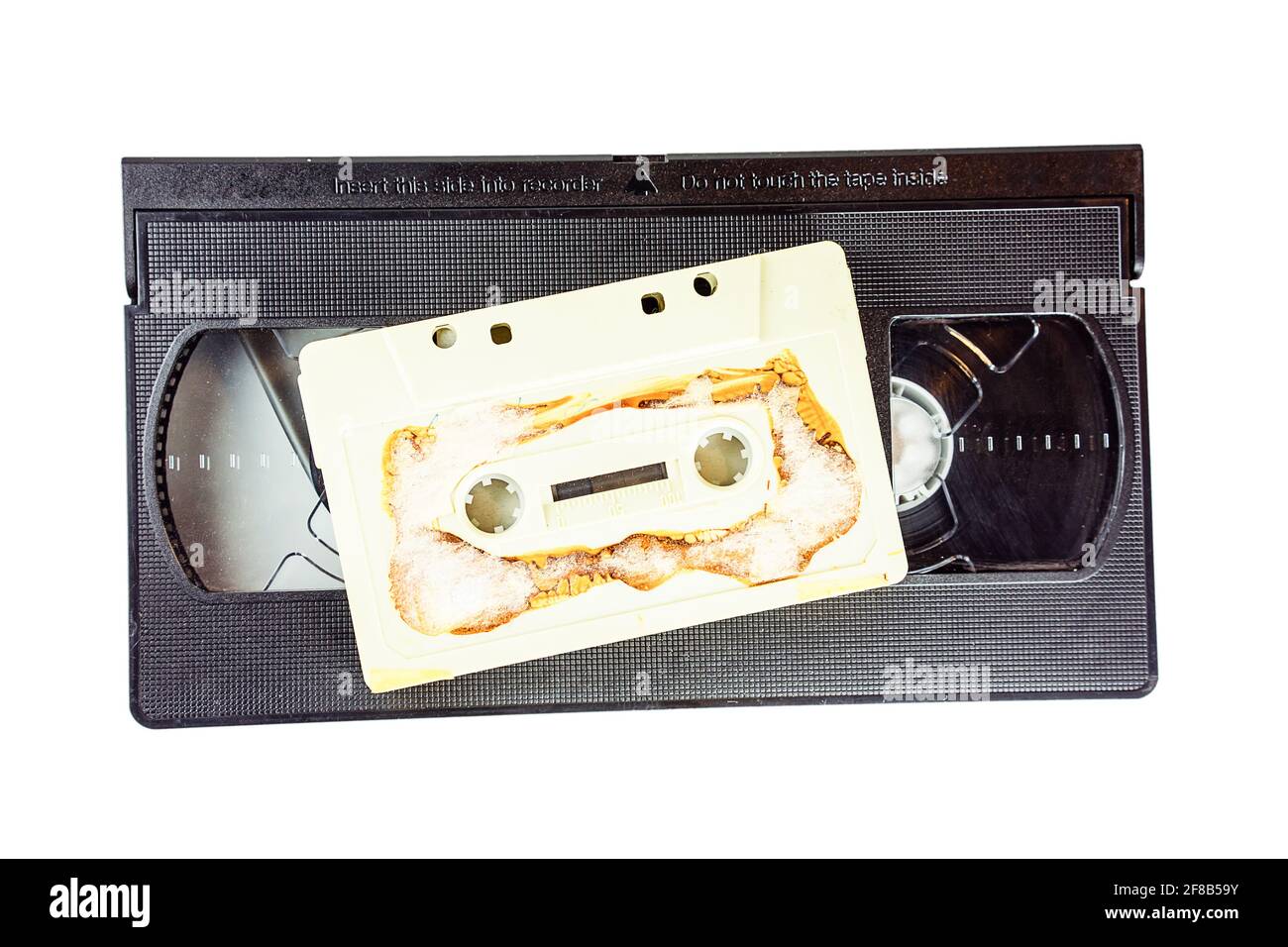 Old film cassette isolated on a white background Stock Photo - Alamy