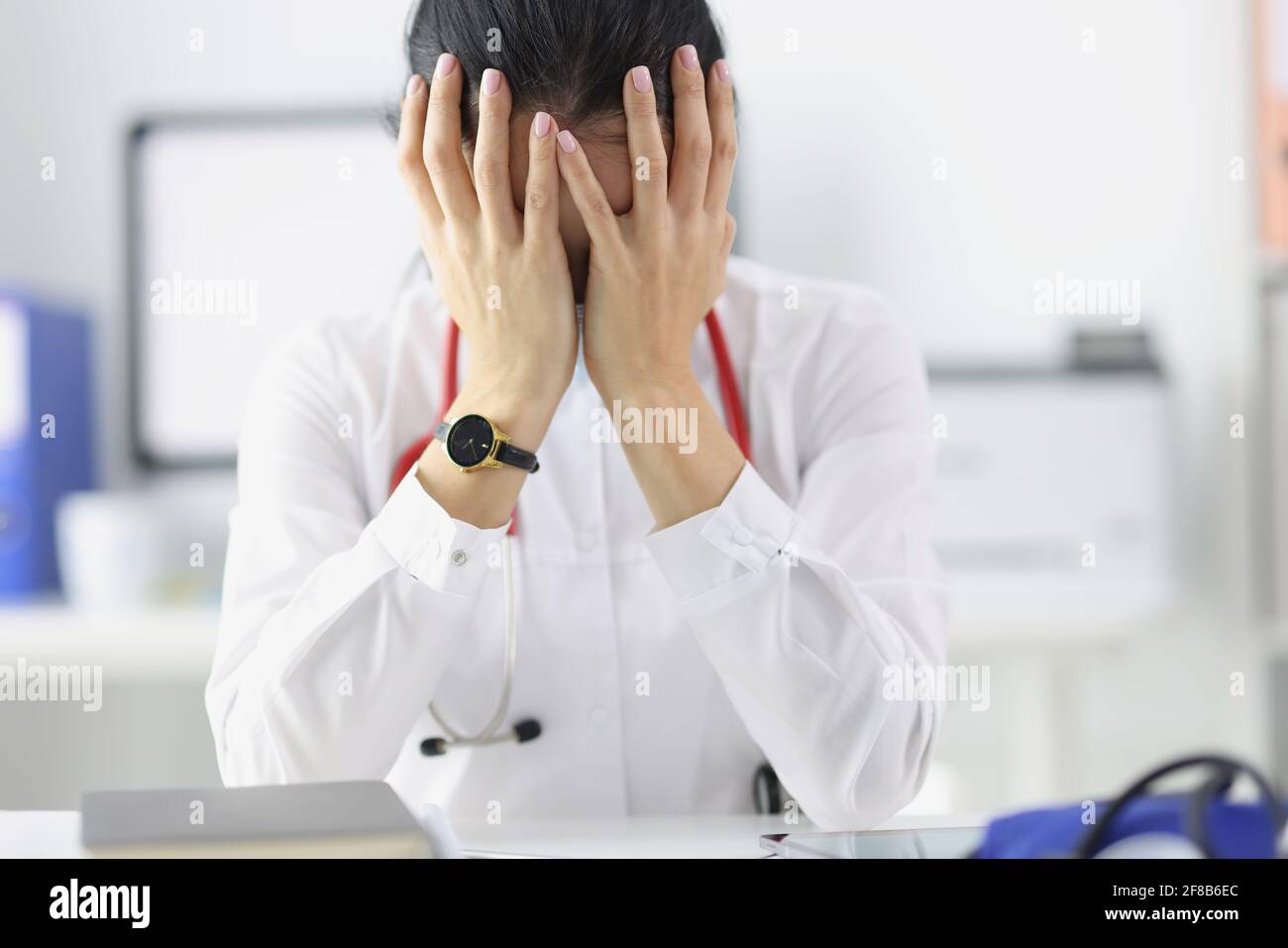 Sad tired surgeon hi-res stock photography and images - Alamy