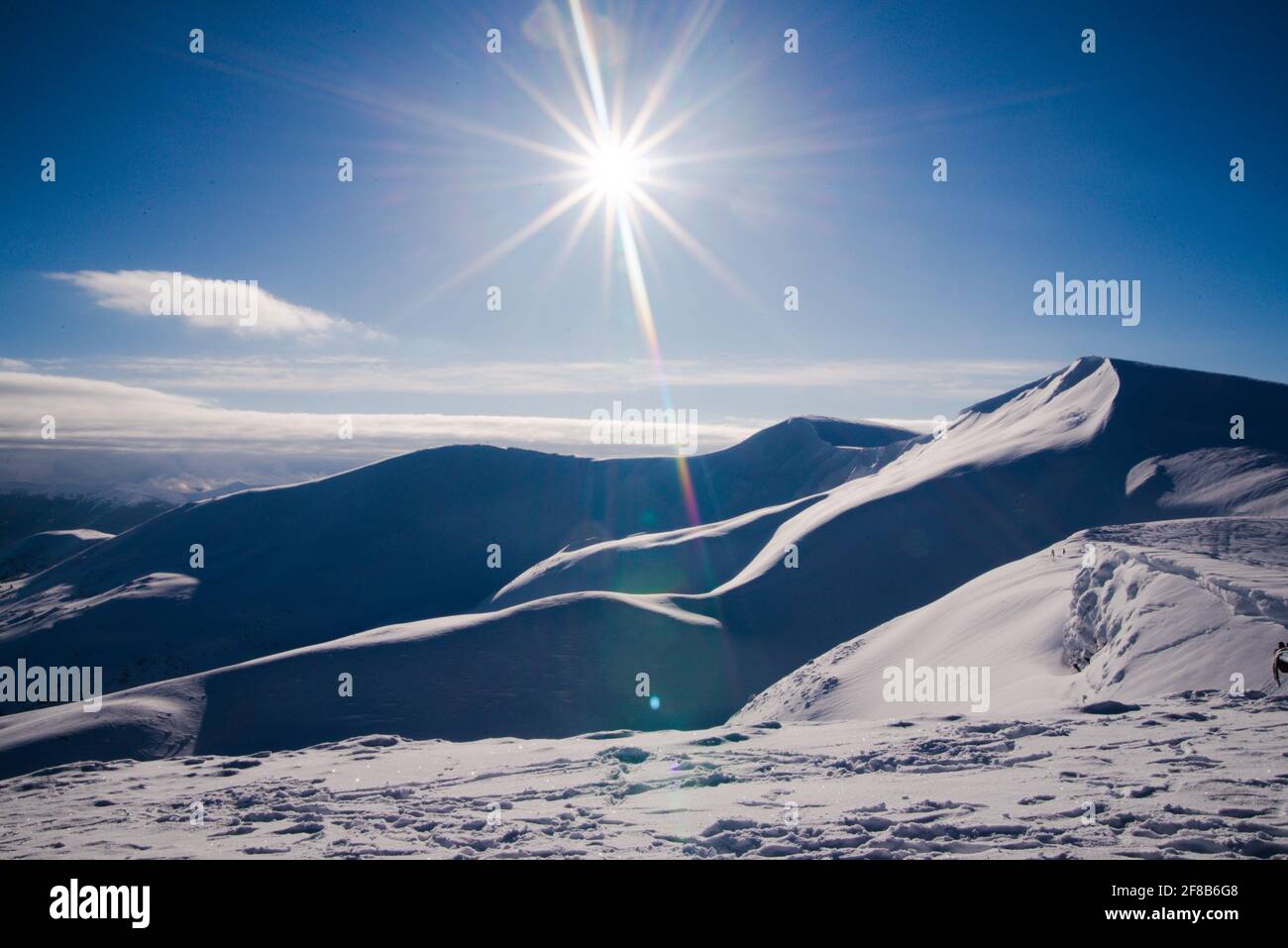 Snowy mountains in sun morning. Great view over some mountain ranges ...