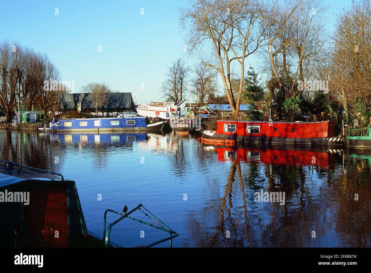 The River Lea Navigation and boatyard in springtime near Springfield ...