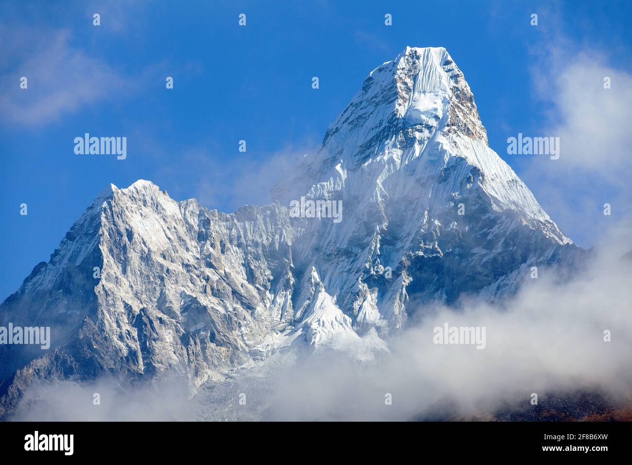Mount Ama Dablam within clouds, way to Everest base camp, Khumbu valley ...