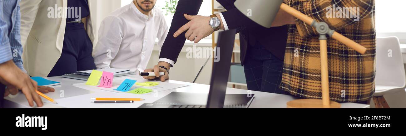 Creative young business team working on a new project in a corporate ...