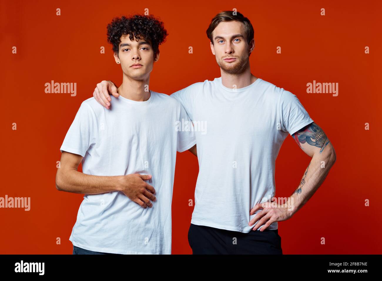 two men hugging friendship communication lifestyle fun Stock Photo - Alamy