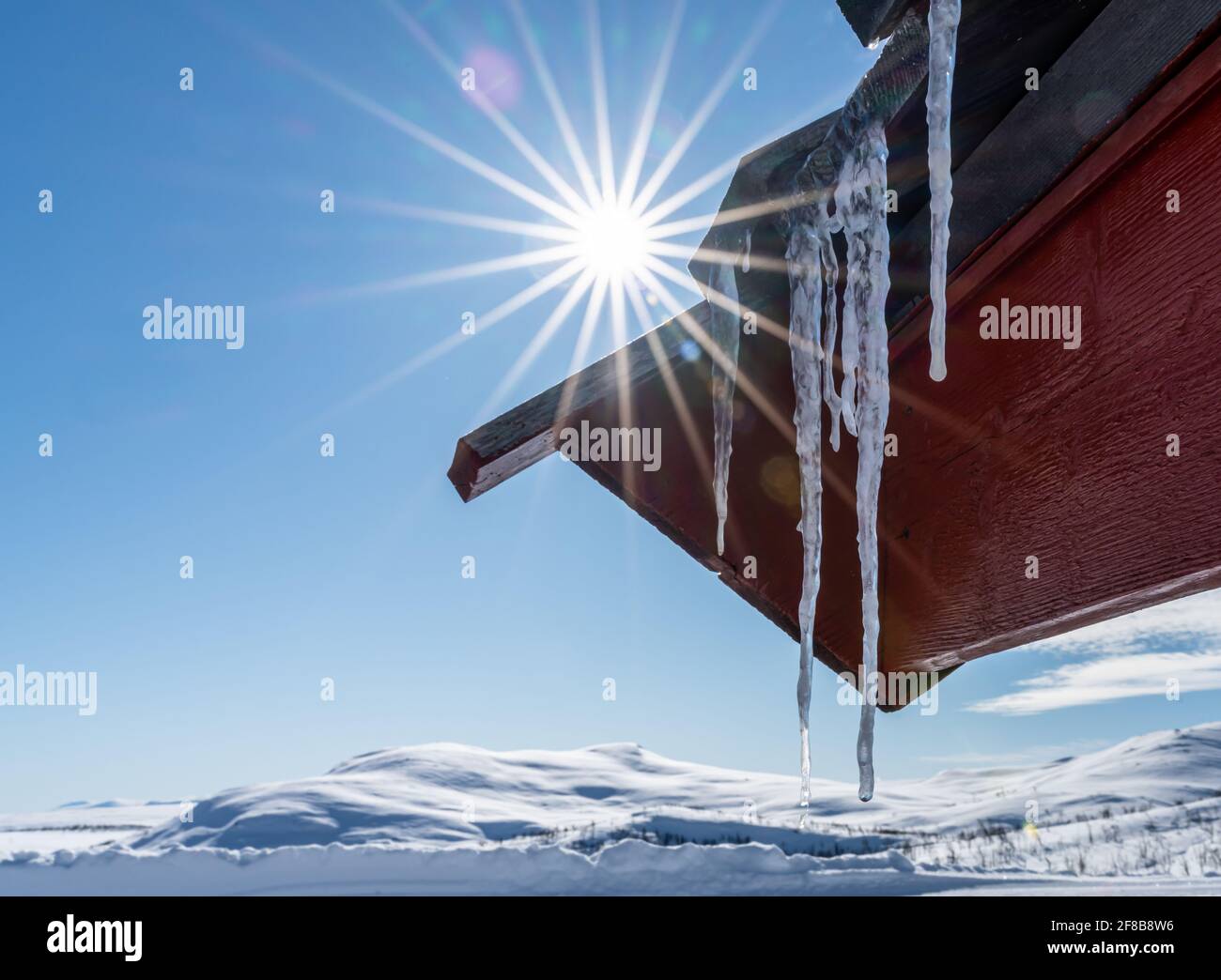 Ice snow drip from roof hi-res stock photography and images - Alamy