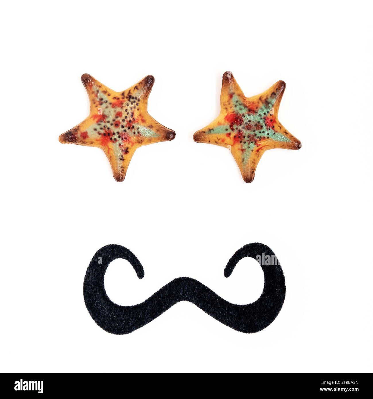 Male anthropomorphic face, with starfish eyes and black mustache Stock ...