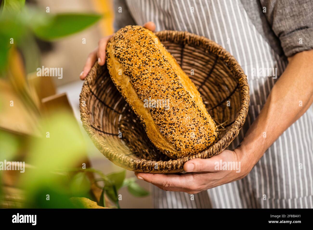 Hands holding basket hi-res stock photography and images - Alamy