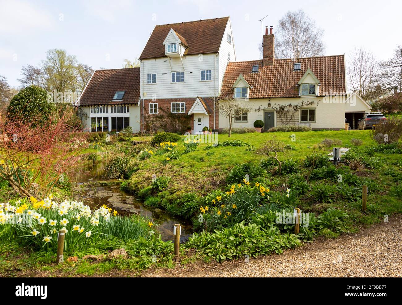 Former watermill and attached cottage with stream and gardens ...