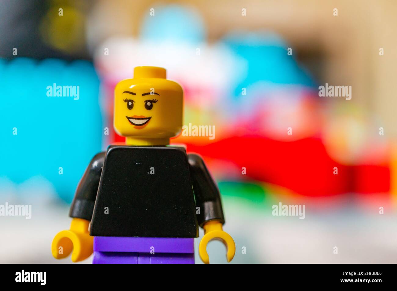 POZNAN, POLAND - Mar 27, 2021: Lego female figurine with a happy ...