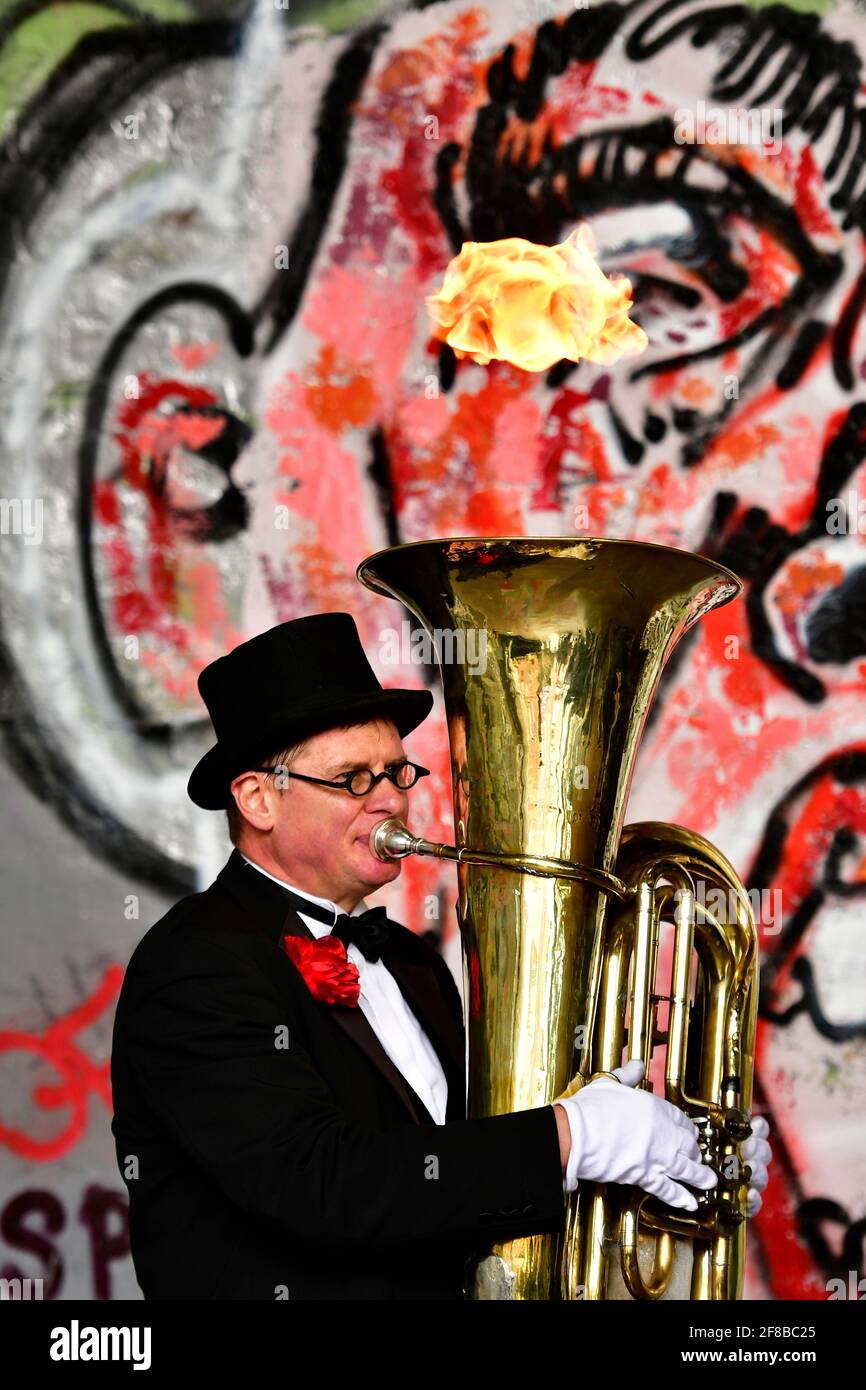 Fire Tuba player The Southbank, London, England Stock Photo - Alamy