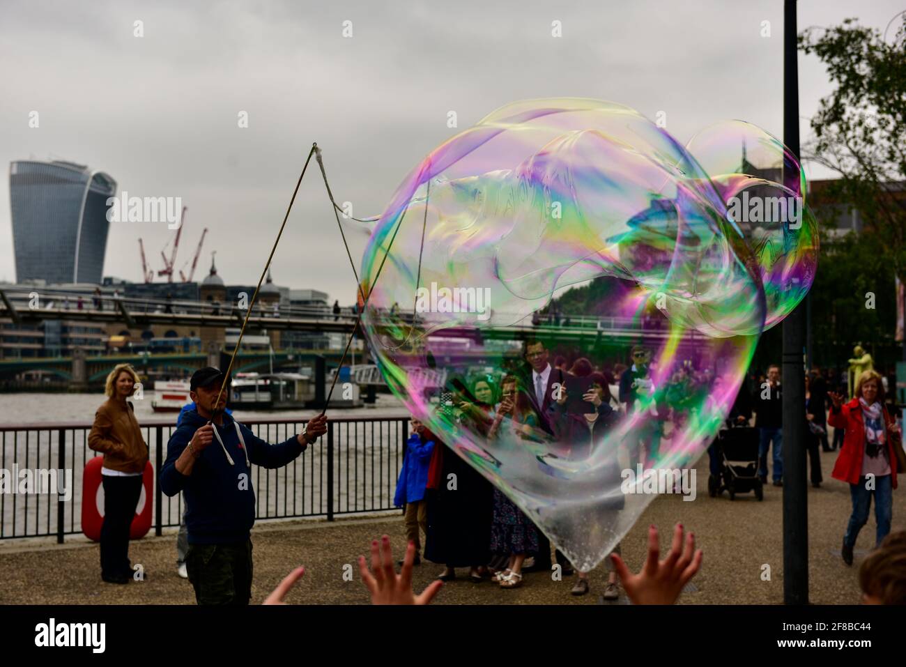 Bubble Blowing, The Southbank, London, England Stock Photo - Alamy