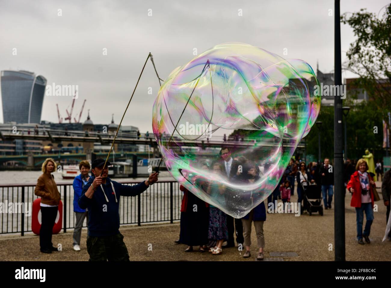 Bubble Blowing, The Southbank, London, England Stock Photo - Alamy