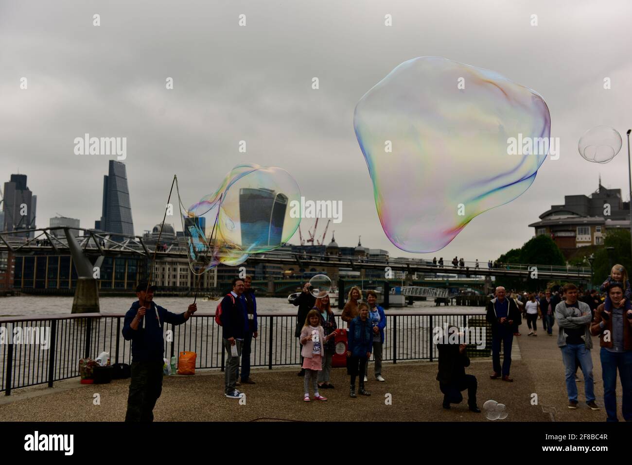Bubble Blowing, The Southbank, London, England Stock Photo - Alamy