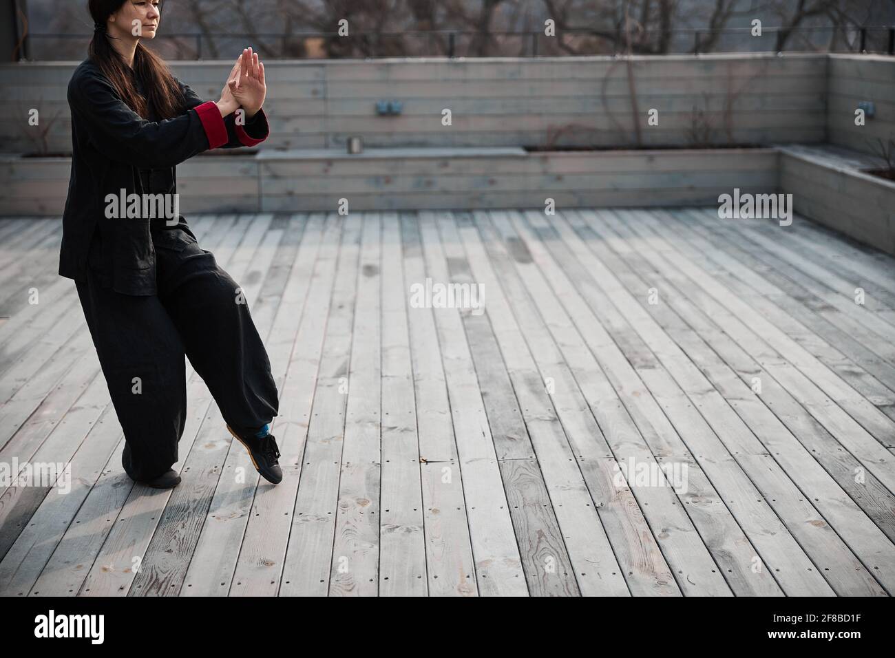 Crossed palms held by woman in tai chi position Stock Photo - Alamy