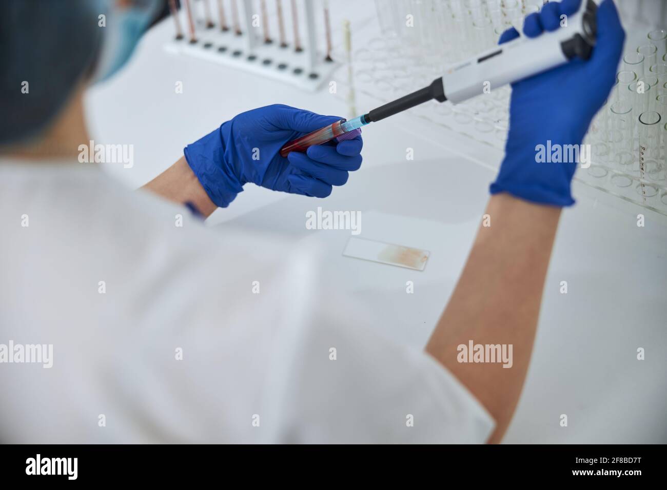 Experienced biochemist working in a clinical biochemistry laboratory ...