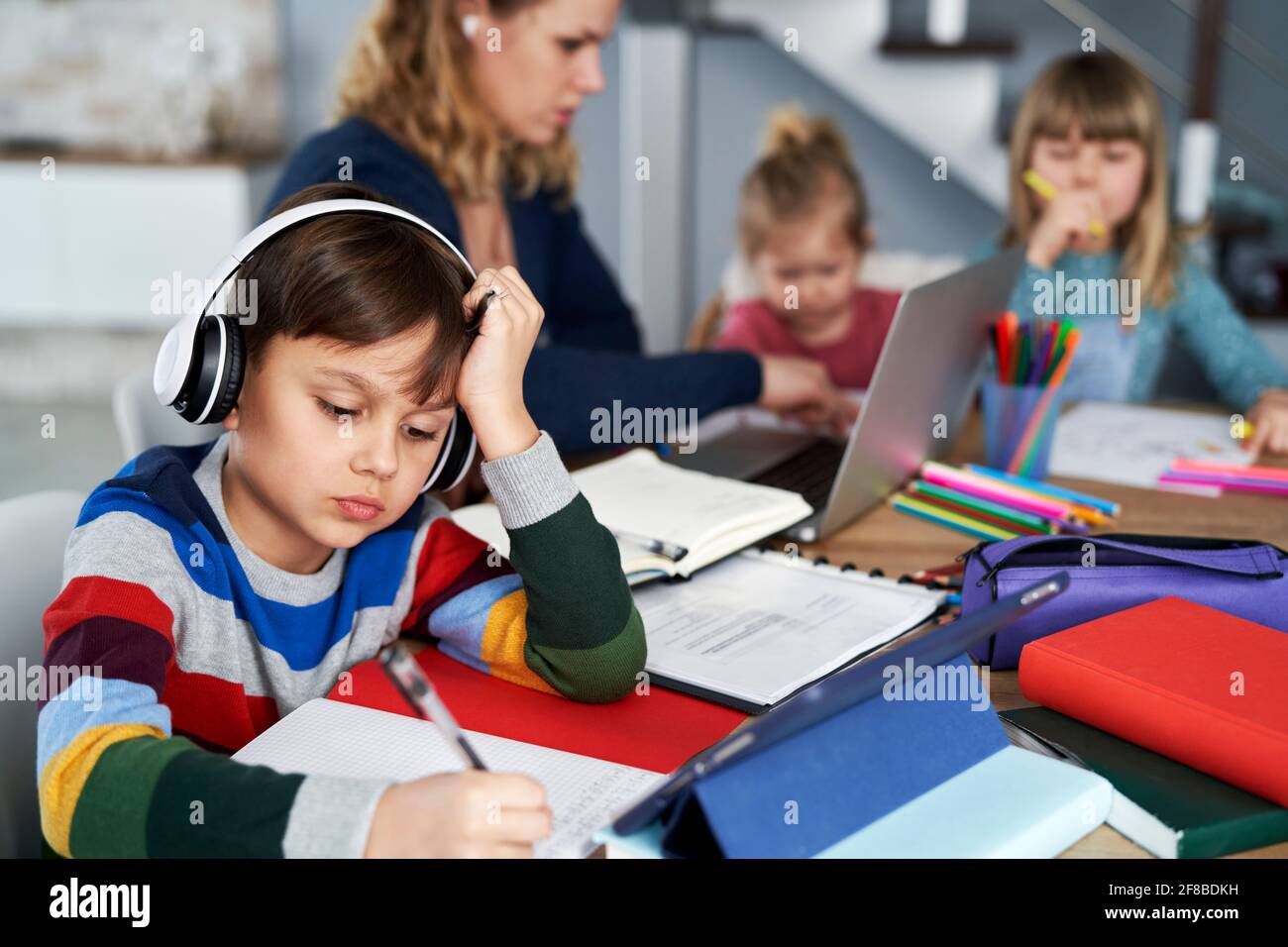 Mother with children during lockdown at home Stock Photo - Alamy