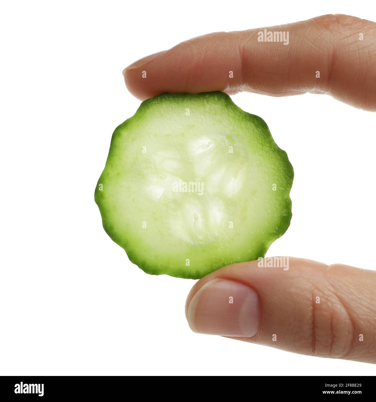 Female hand hold cucumber slice, isolated on white background Stock ...